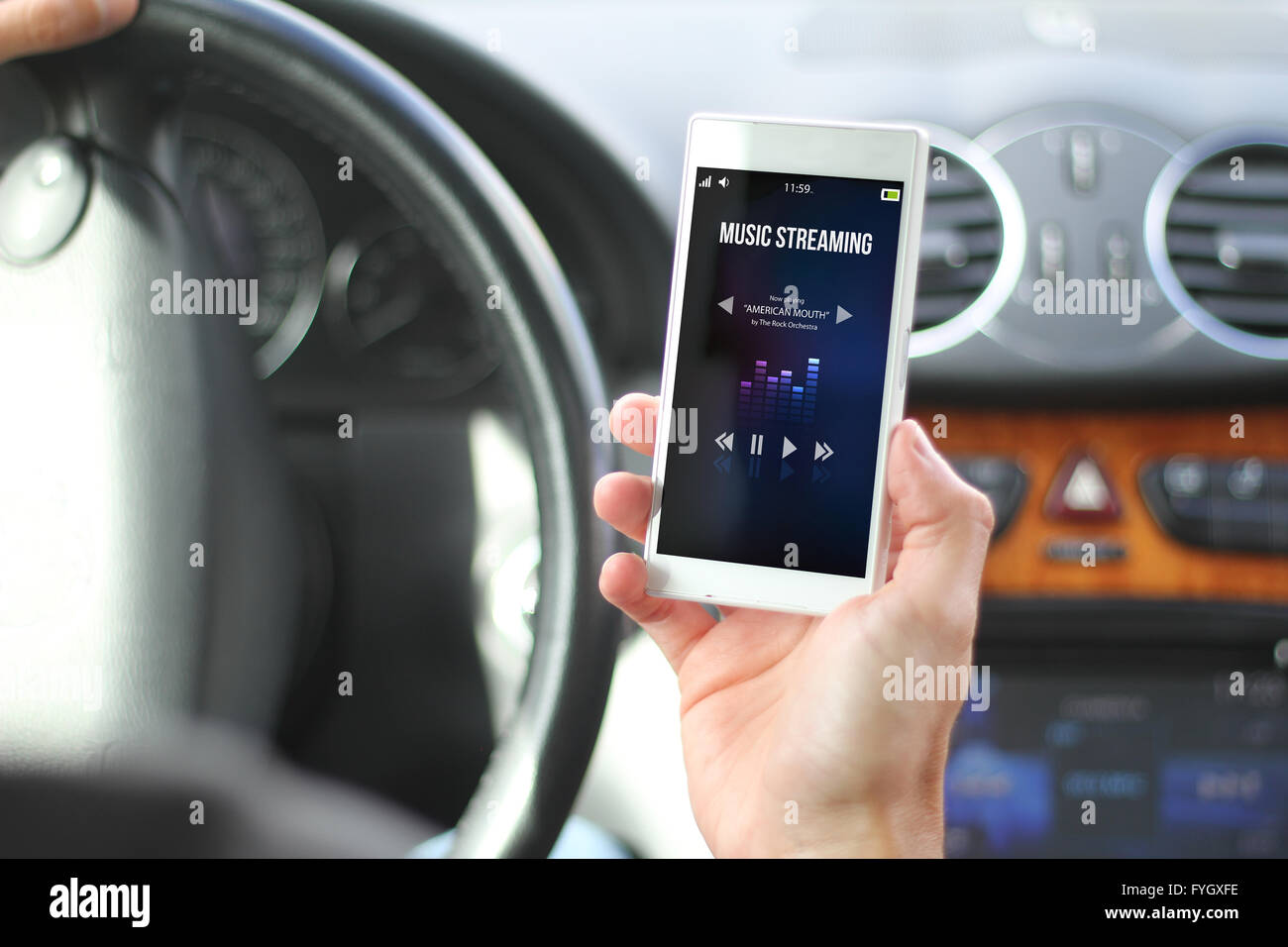 driver holding smartphone with music streaming interface. All screen ...