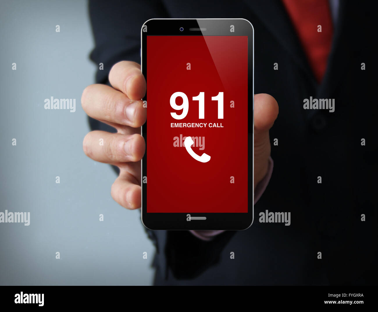 emergency concept: businessman hand holding a 3d generated touch phone ...