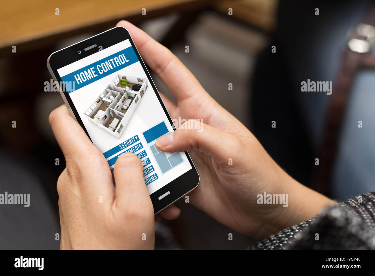smart home concept: girl using a digital generated phone with home ...