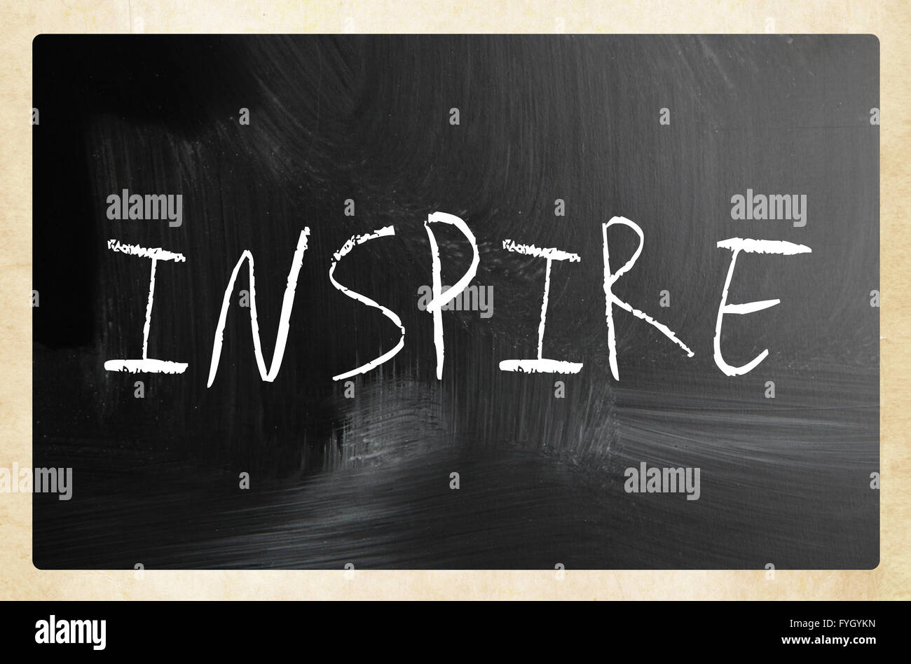 Inspire handwritten with white chalk on a blackboard Stock Photo - Alamy
