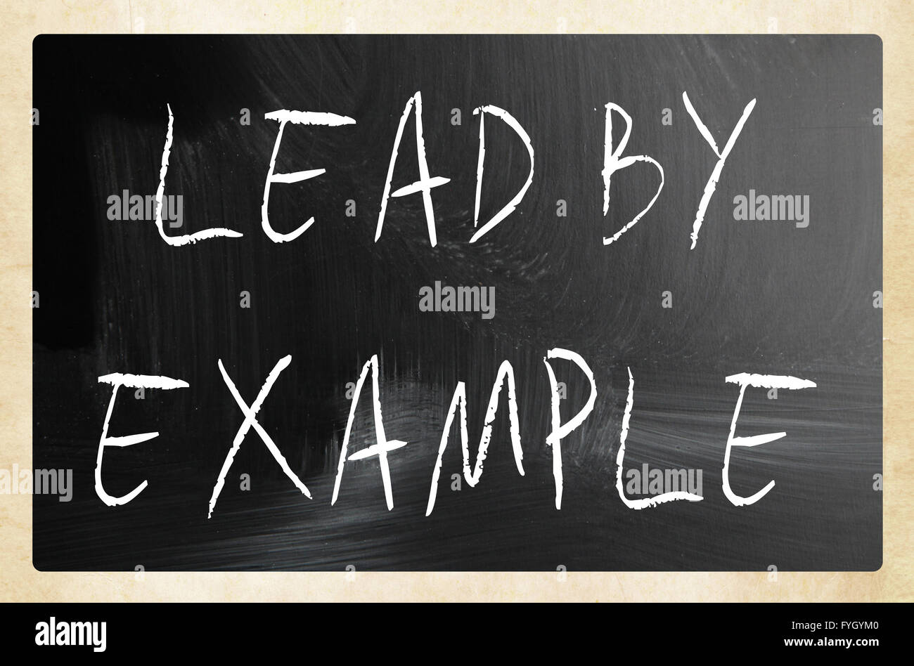 Lead by example handwritten with white chalk on a blackboard Stock ...