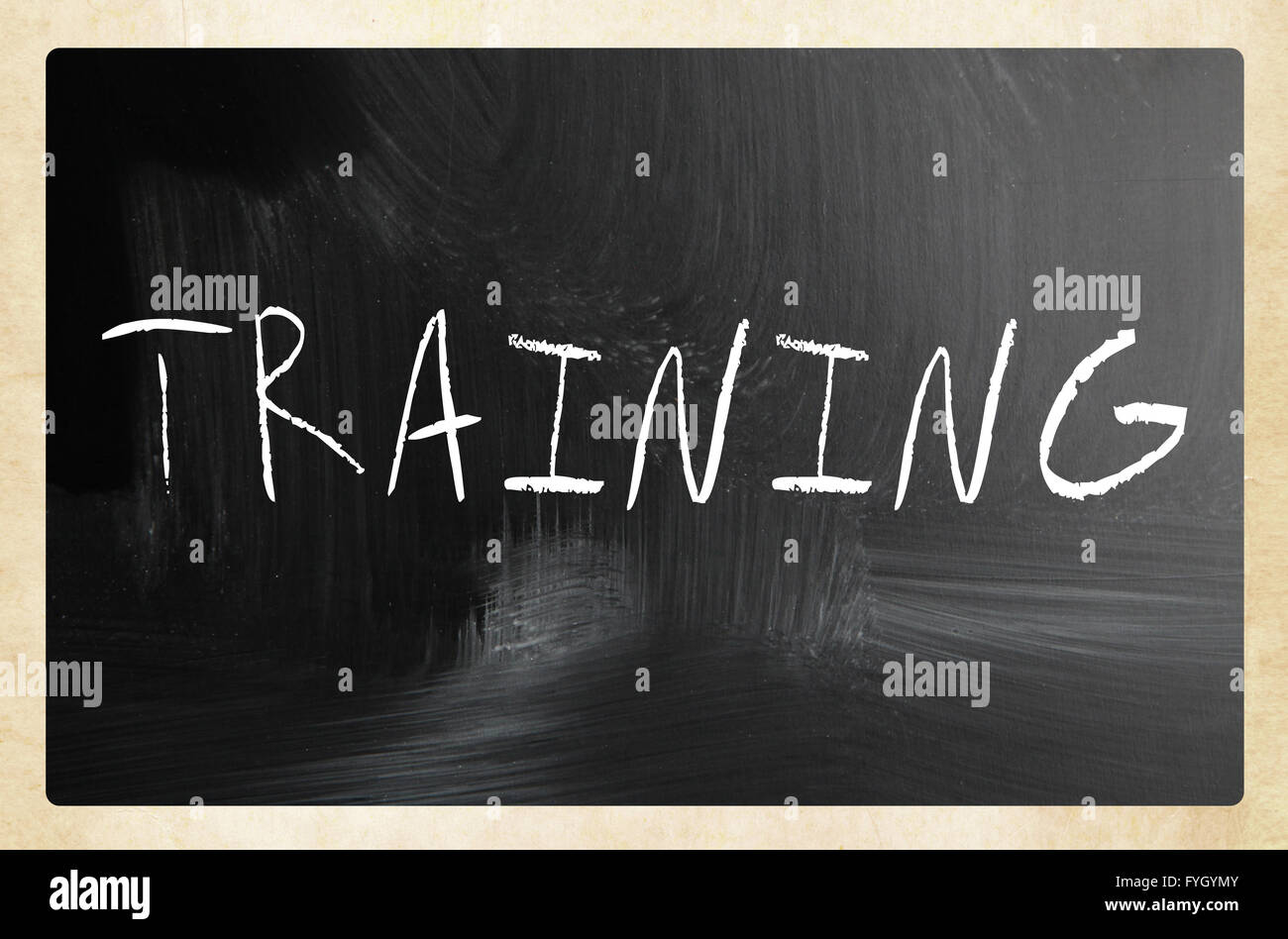 Training handwritten with white chalk on a blackboard Stock Photo - Alamy