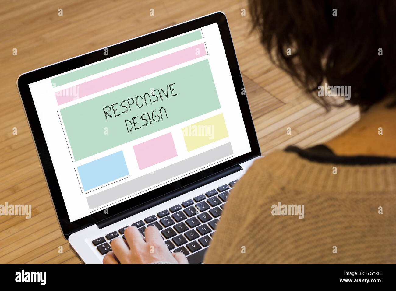web design concept: responsive design wireframe on a laptop screen ...