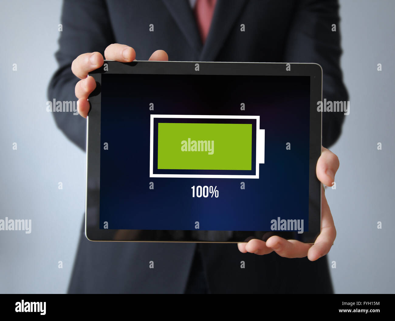 energy concept: render of a tablet with full battery on the screen. All ...