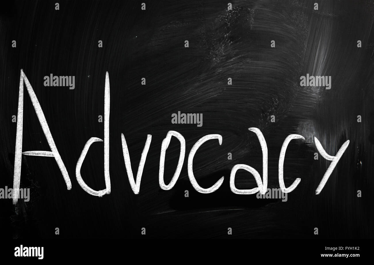 The word 'Advocacy' handwritten with white chalk on a blackboard Stock ...