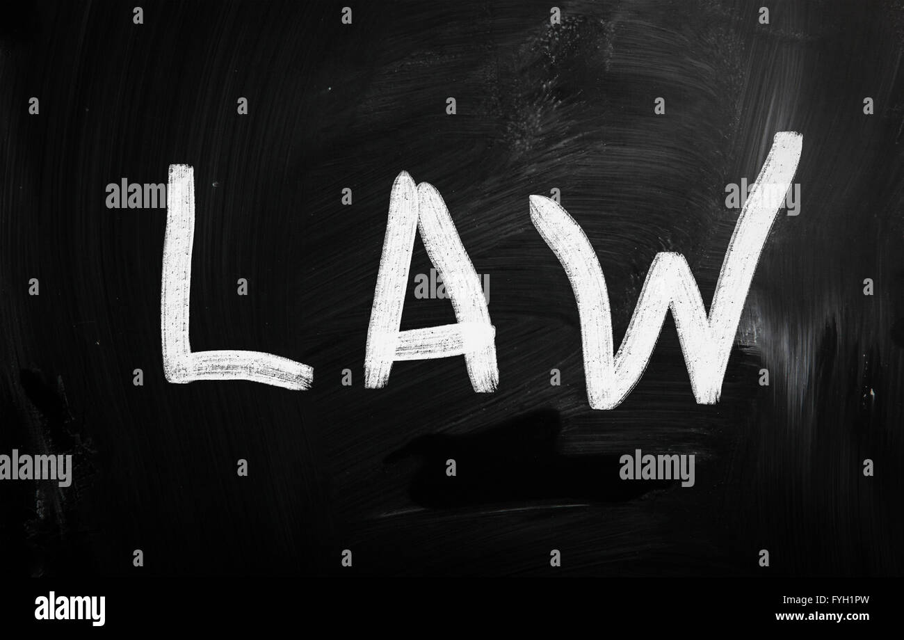 The word Law handwritten with white chalk on a blackboard Stock Photo ...