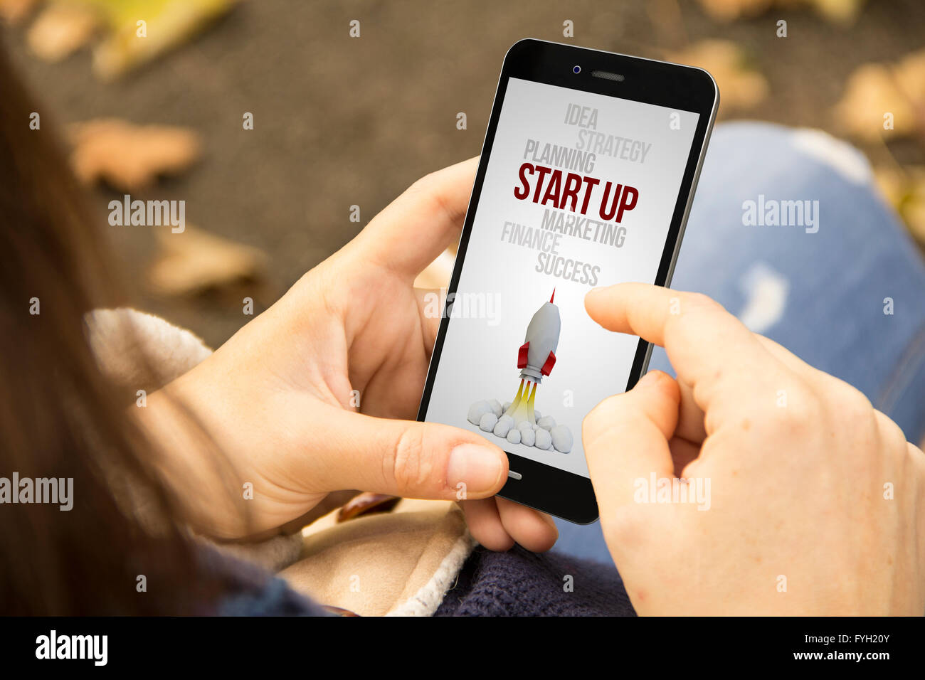 business starting concept: woman holding a 3d generated smartphone with ...