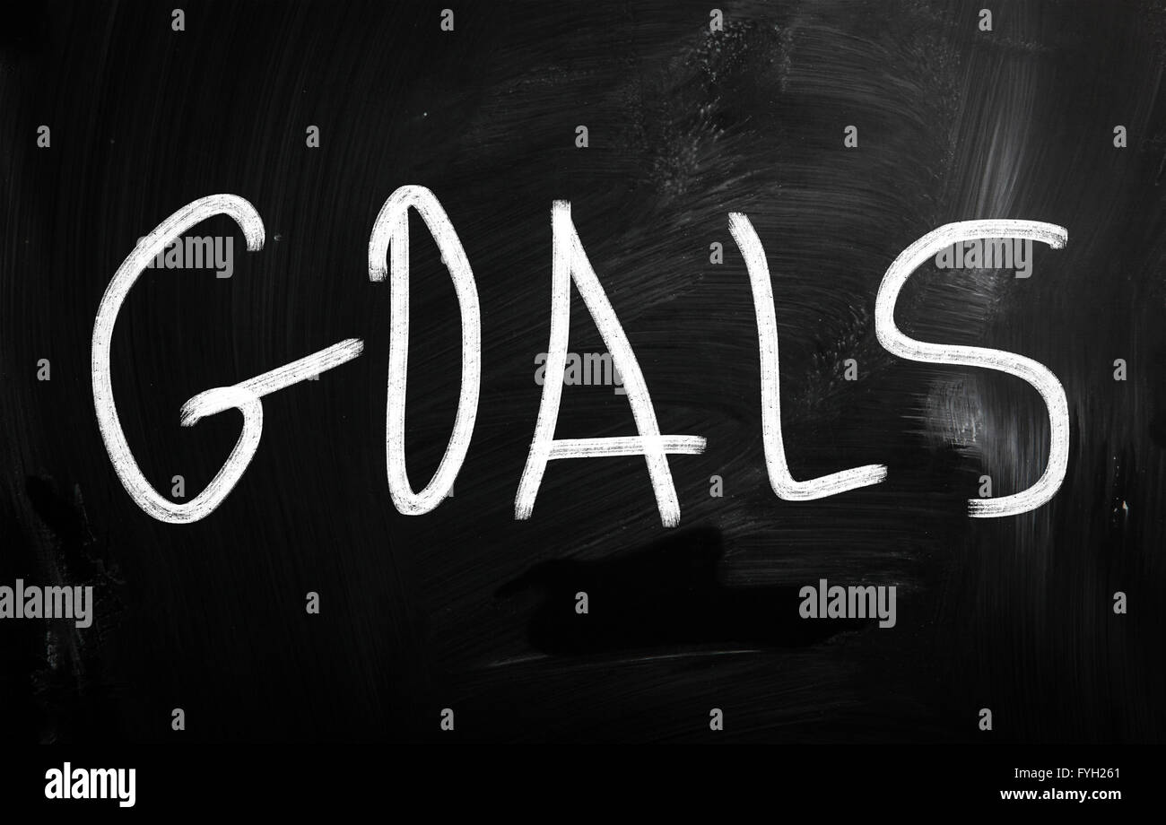 Goals handwritten with white chalk on a blackboard Stock Photo - Alamy