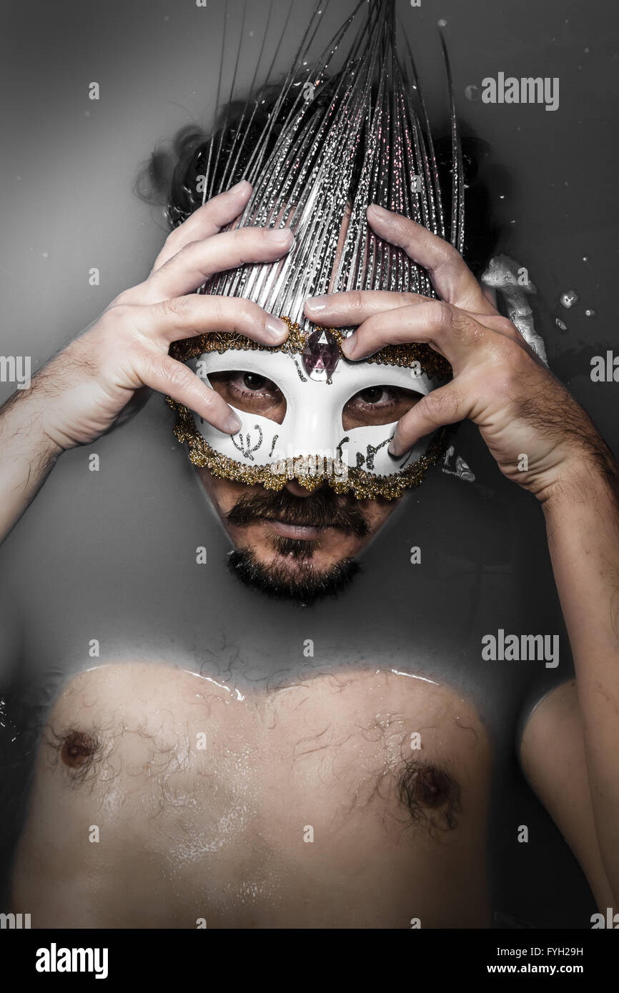 Man with mask, melancholy and suicide, sadness and depression concept ...