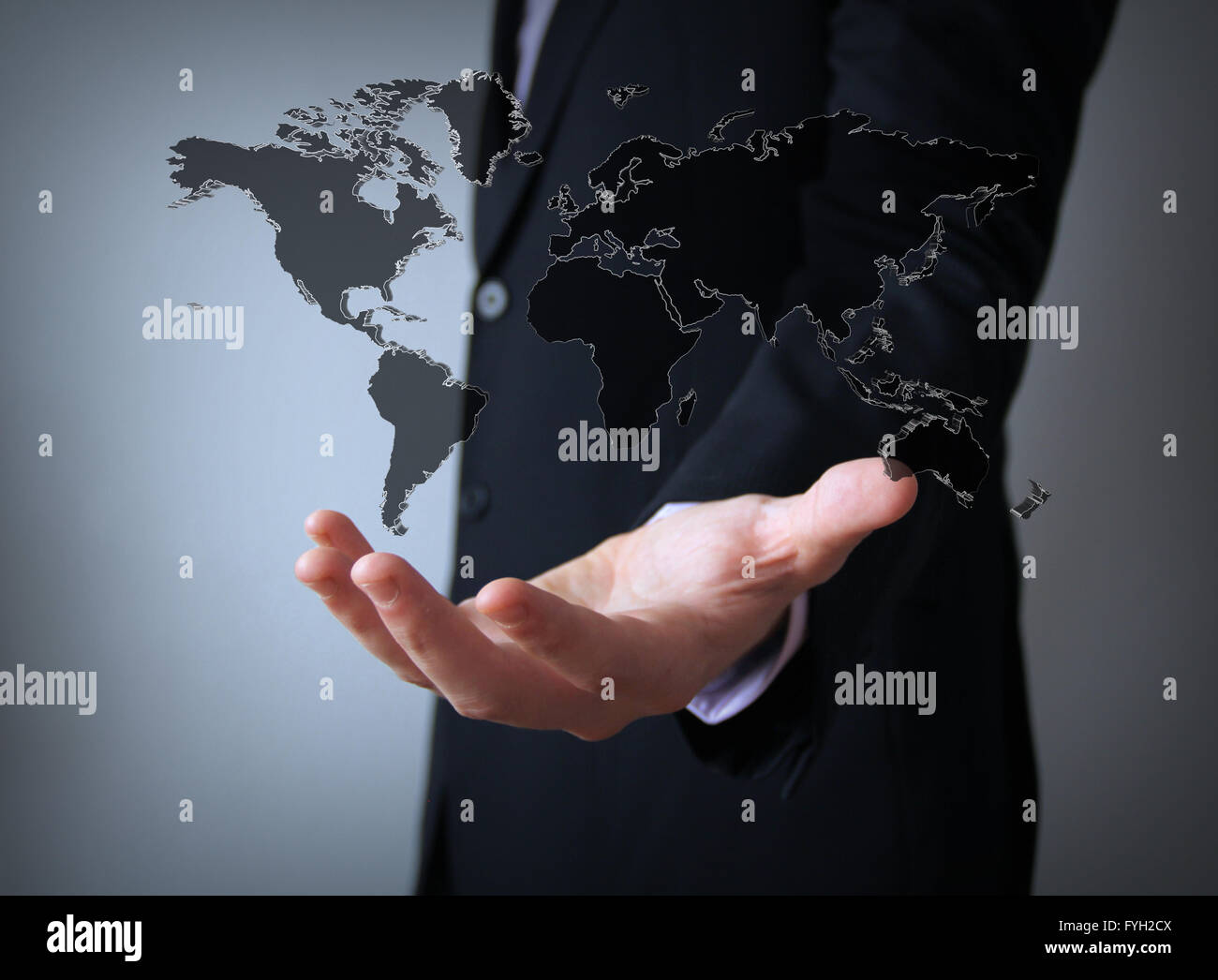 World map over businessman han hi-res stock photography and images - Alamy