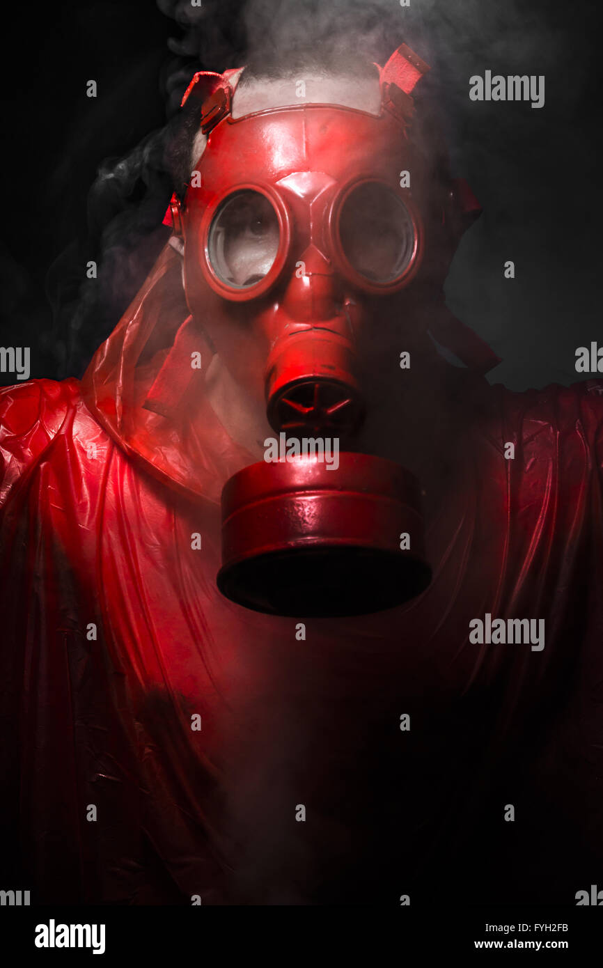 War concept, man with red gas mask Stock Photo - Alamy