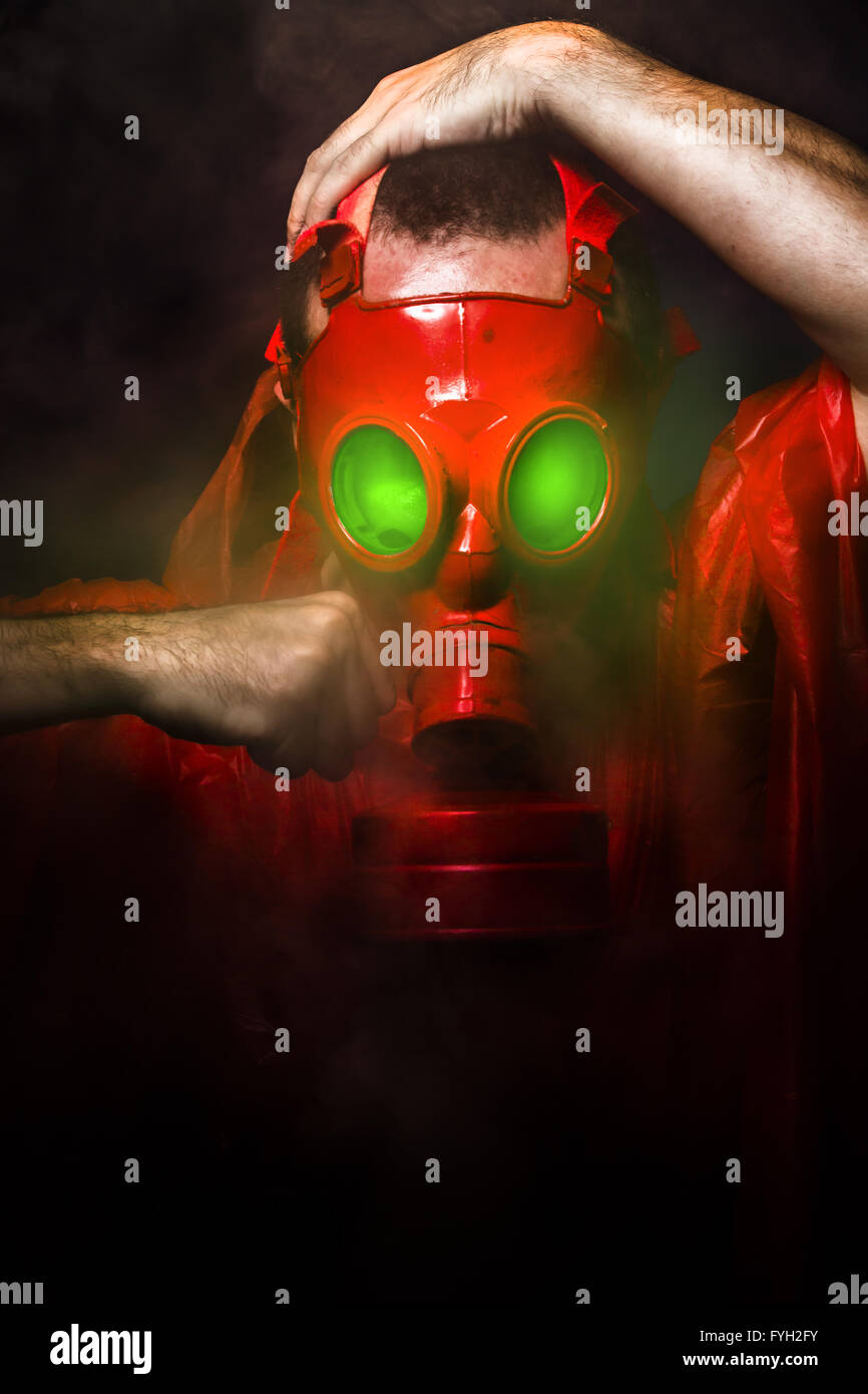 Toxic horror concept, man with red gas mask Stock Photo - Alamy