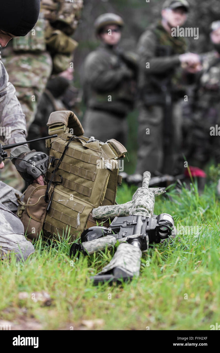 men in military uniform with weapon on a mission Stock Photo - Alamy