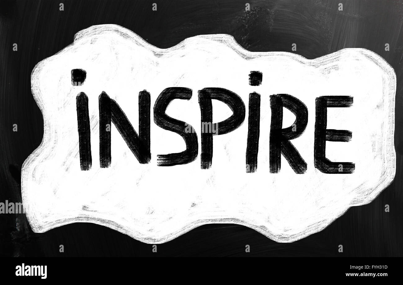 Inspire handwritten with white chalk on a blackboard Stock Photo - Alamy