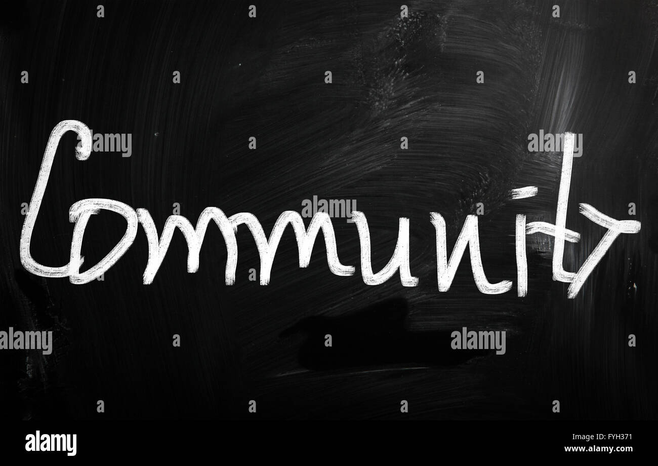 Community handwritten with white chalk on a blackboard Stock Photo - Alamy