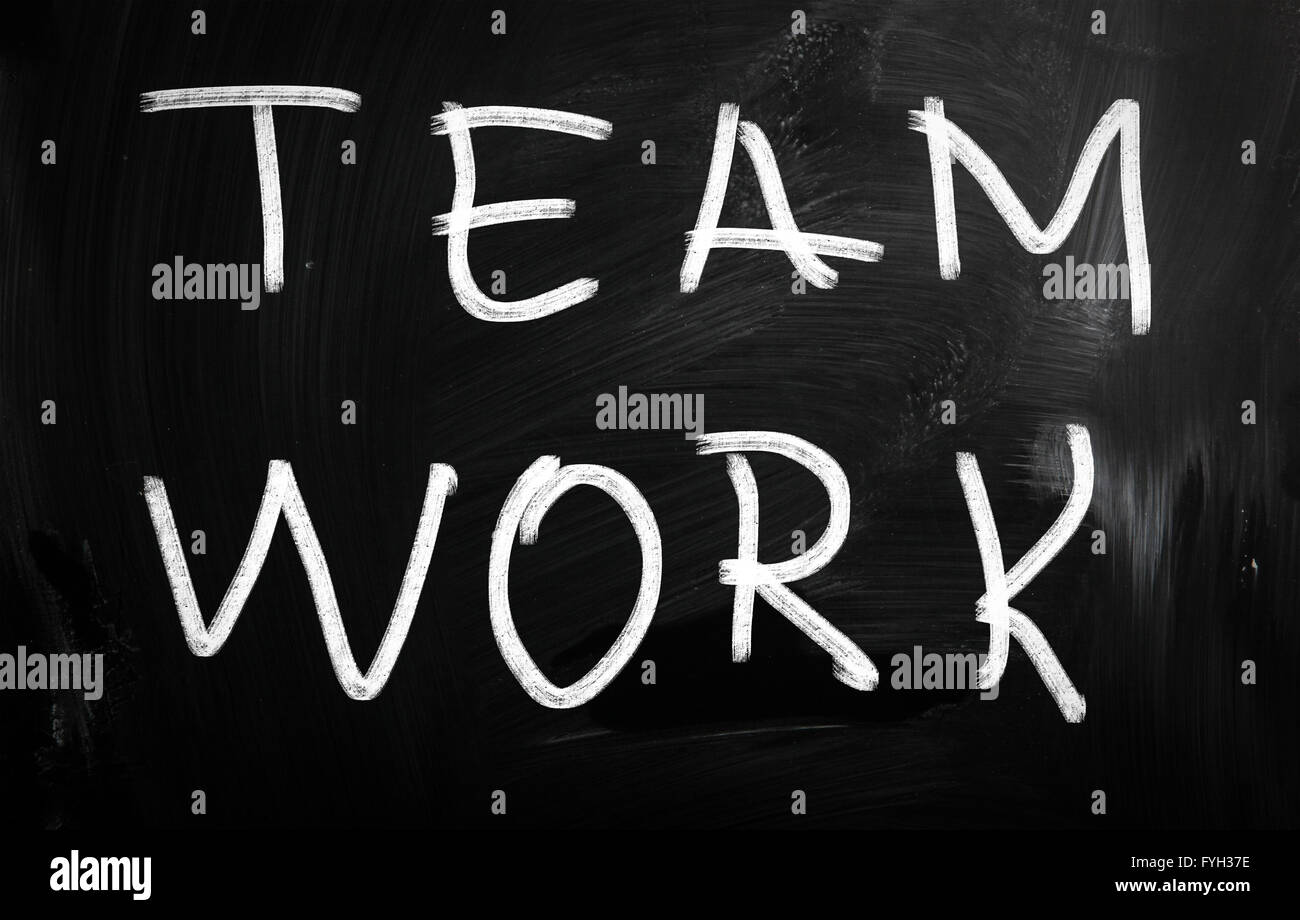 Teamwork handwritten with white chalk on a blackboard Stock Photo - Alamy