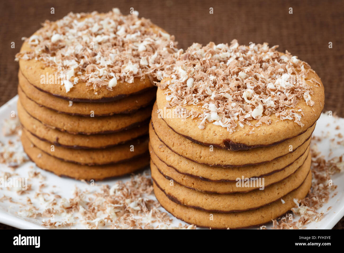 Round cookies with chocolate in a plate Stock Photo - Alamy