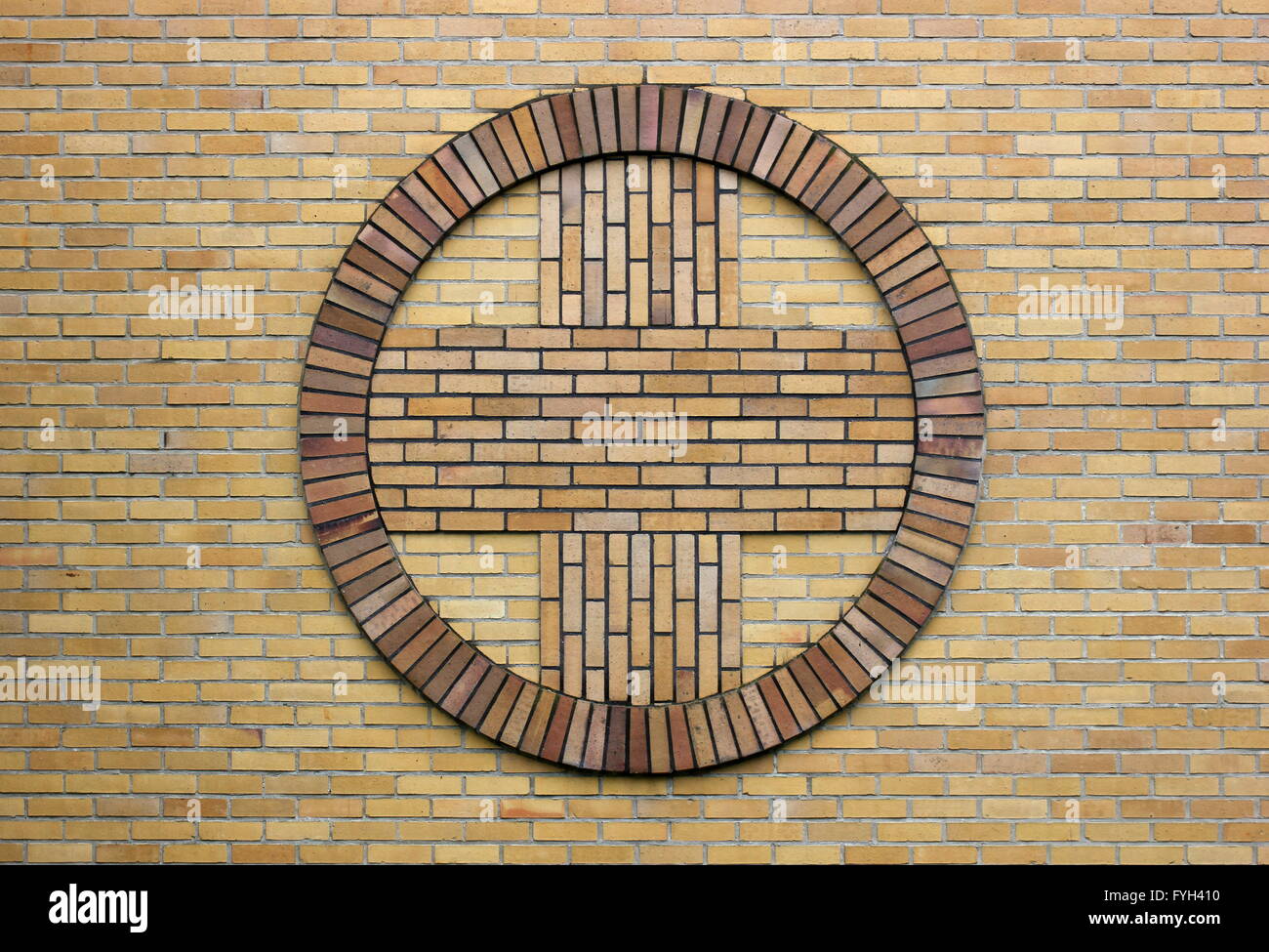 Cross symbol on a church wall Stock Photo - Alamy