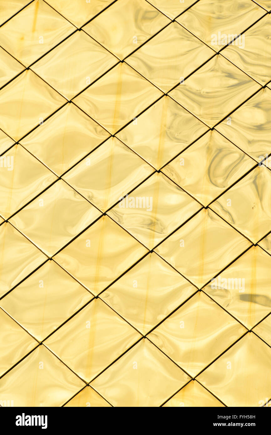 Golden metal shiny vivid rooftop tile panels texture background with ...