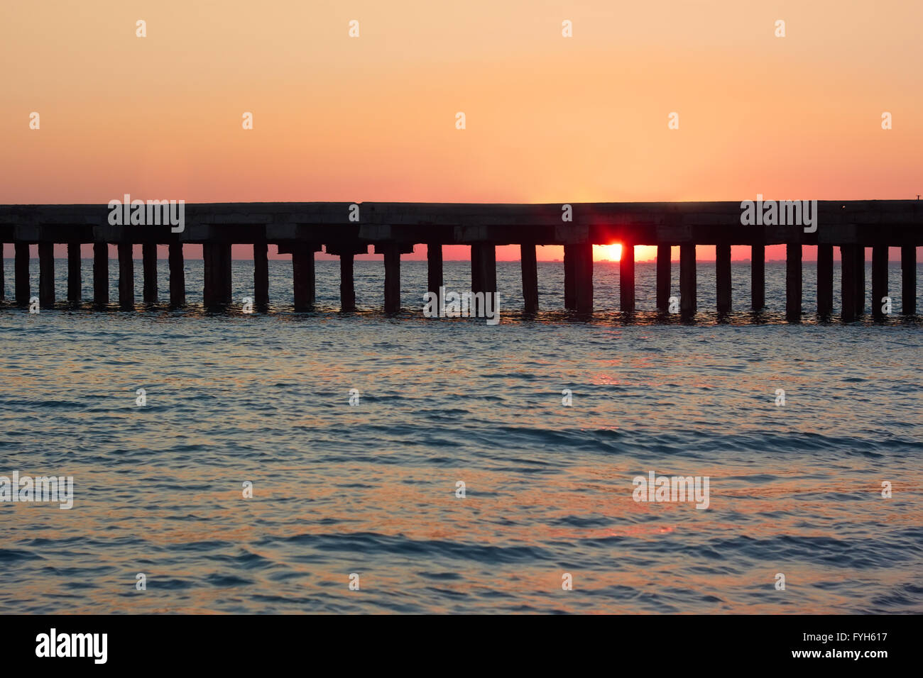 Old pier at sunset hi-res stock photography and images - Alamy