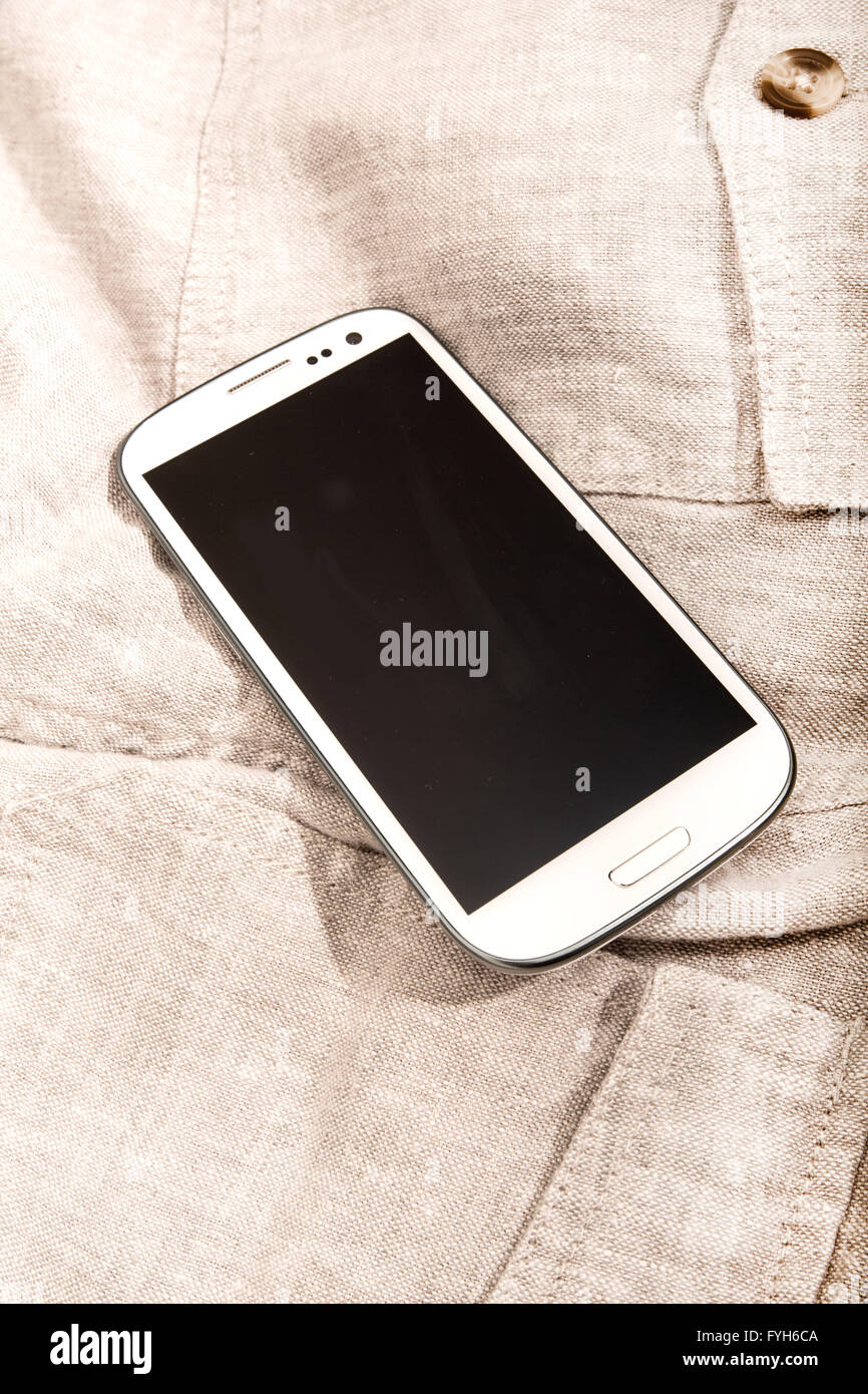 Smartphone on Cloth Stock Photo - Alamy