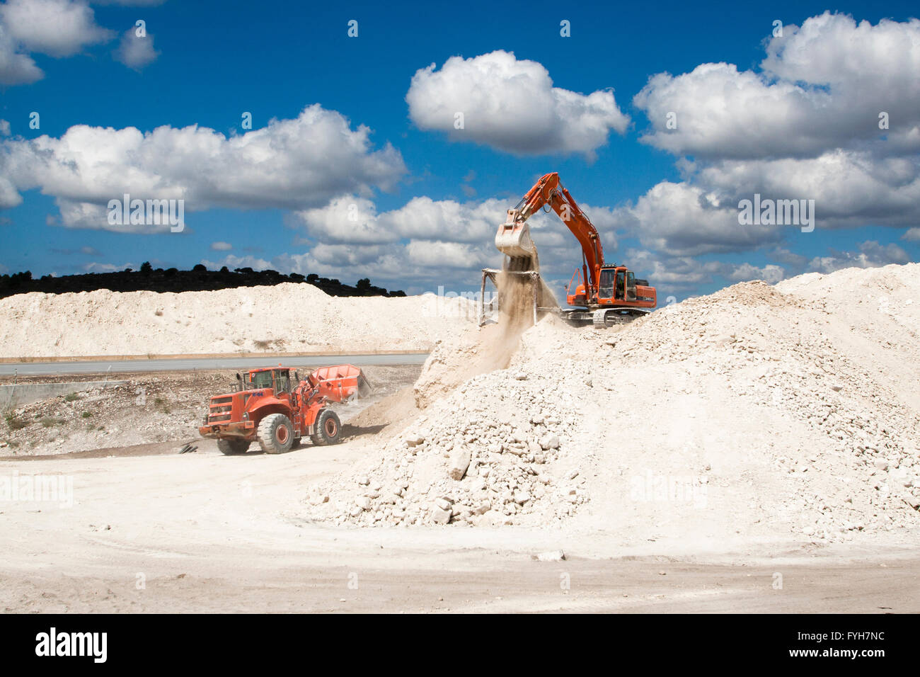 Vehicles working in quarry in hi-res stock photography and images - Alamy