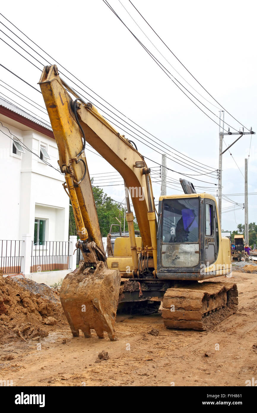 Backhoe loader house hi-res stock photography and images - Alamy