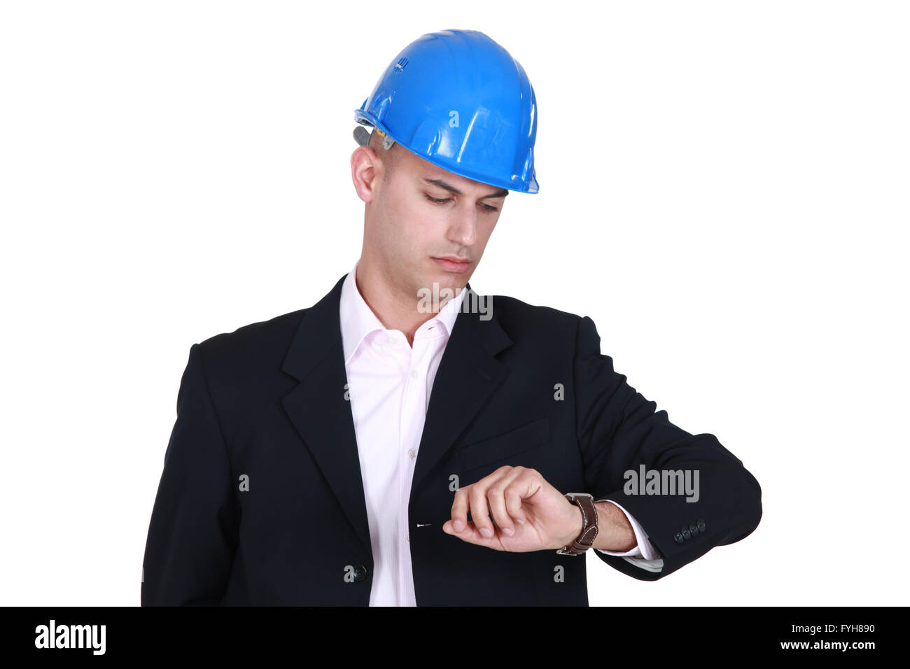 Engineer looking at watch hi-res stock photography and images - Alamy