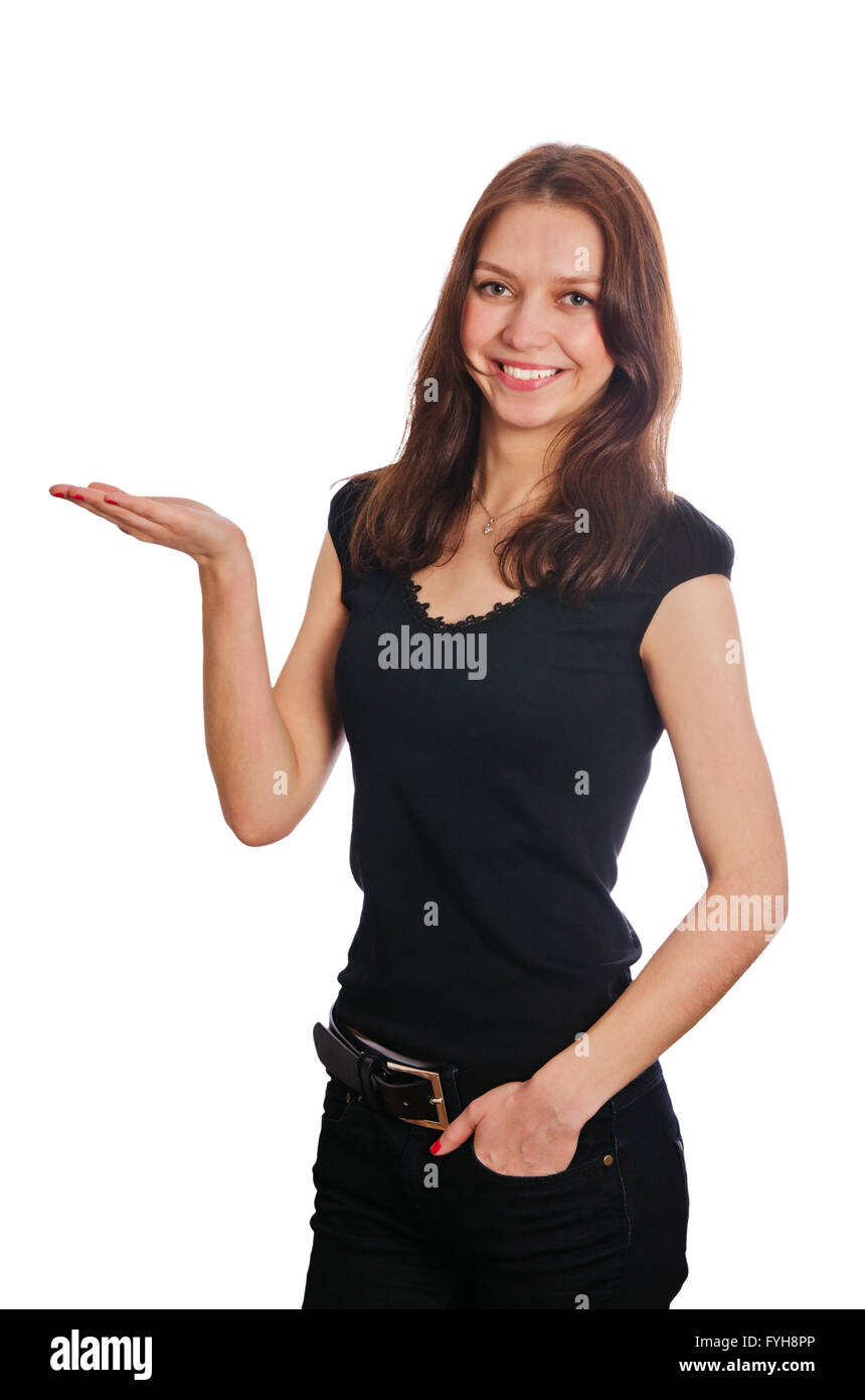 Portrait of pretty young woman holding her hands out and presenting ...