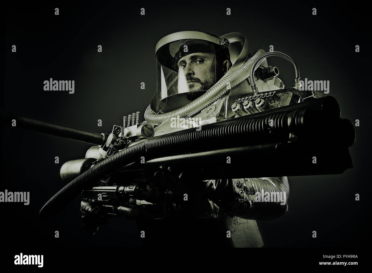 Pilot, fantasy warrior with huge space weapon Stock Photo - Alamy