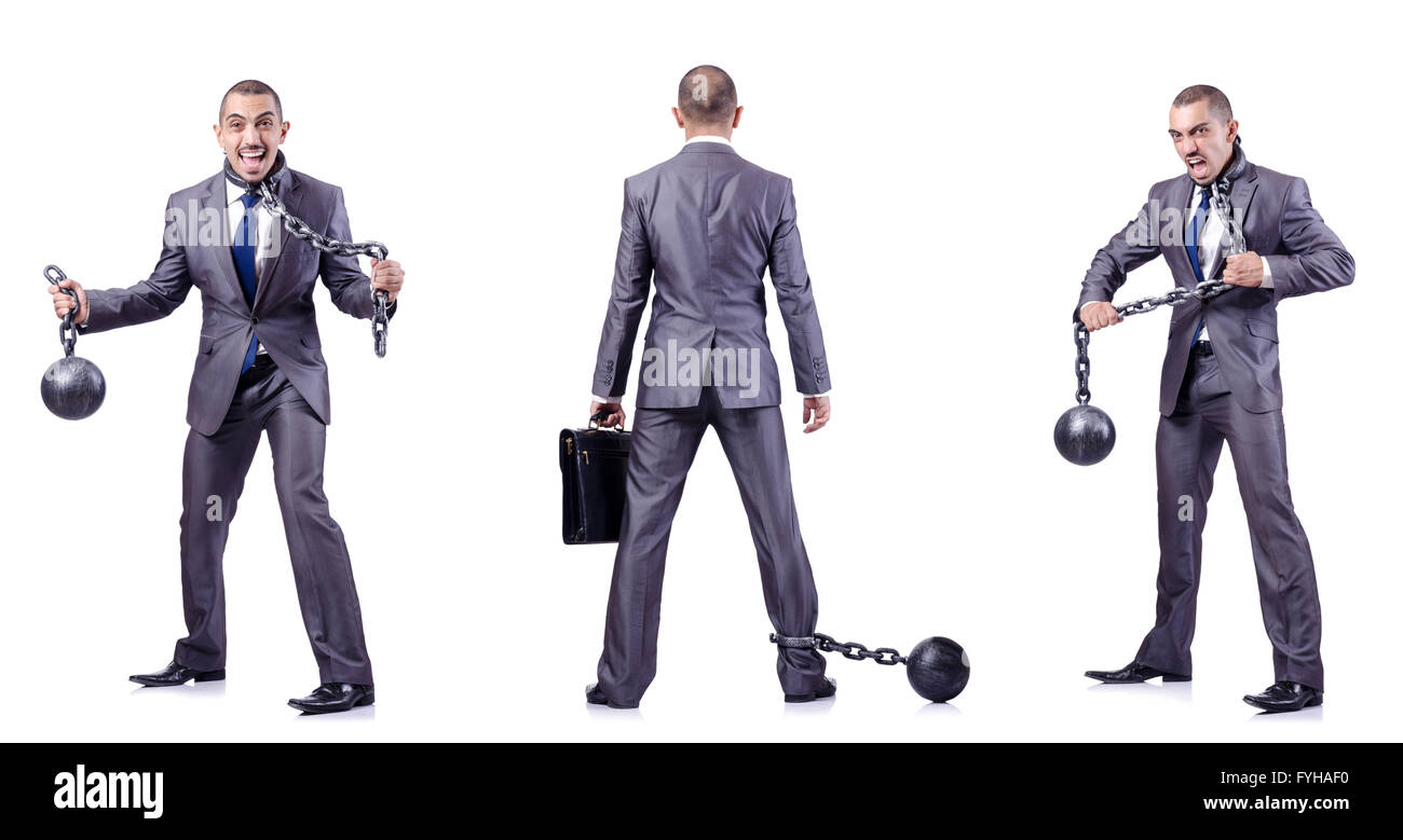 Businessman with shackles on white Stock Photo - Alamy