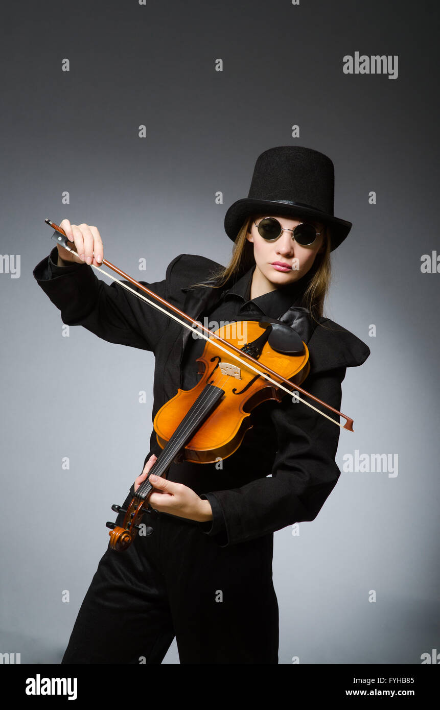 Woman in musical art concept Stock Photo - Alamy