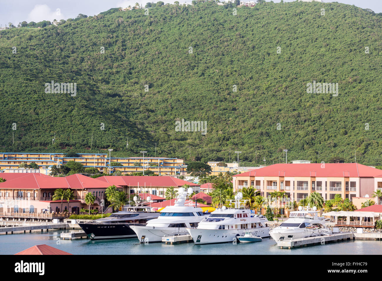 Four yachts in harbor at St Thomas Stock Photo - Alamy