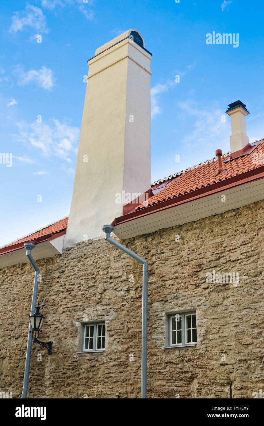 Facade of an ancient building with the big chimney in Tallinn Stock ...