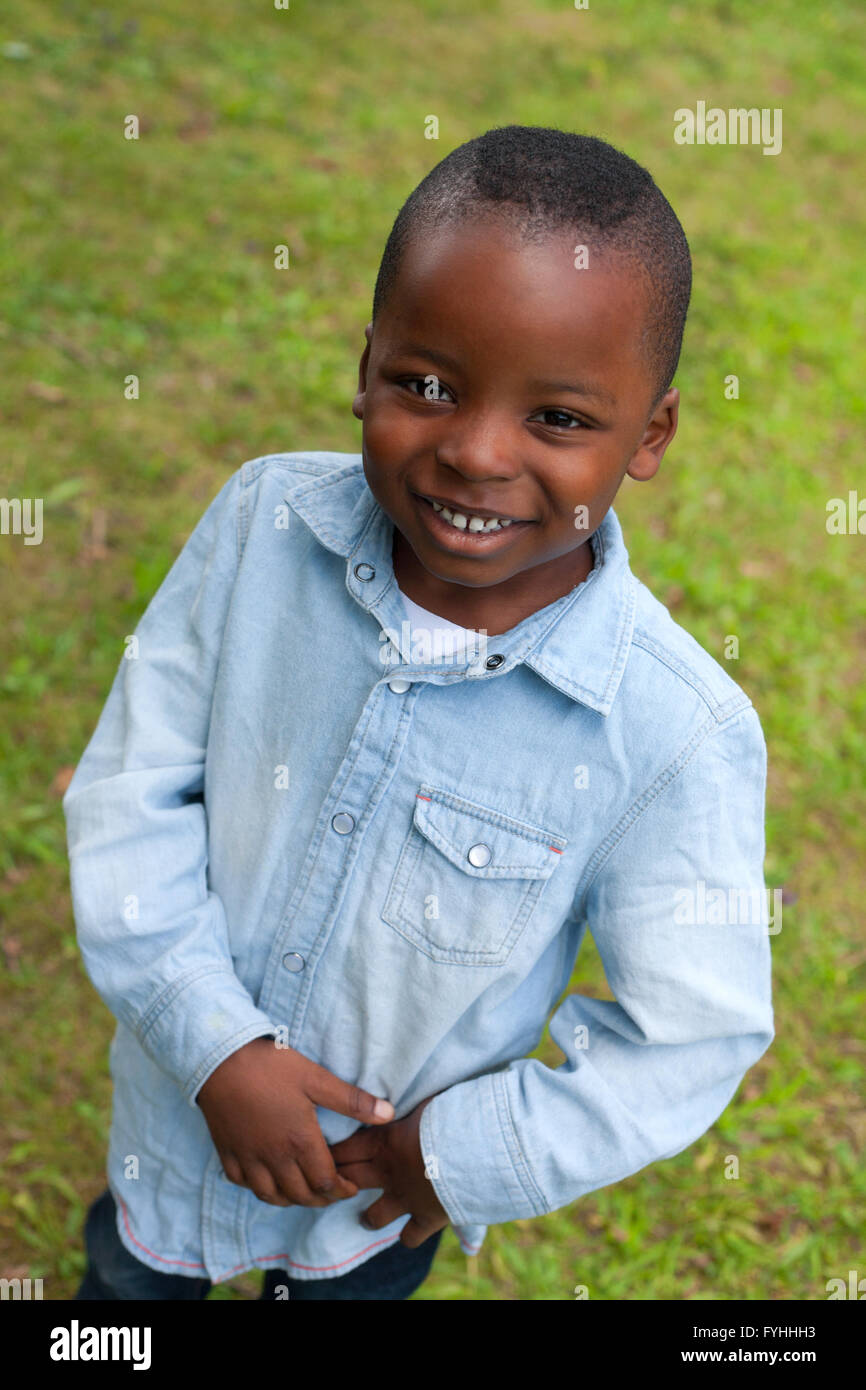 Smile with the african boy Stock Photo - Alamy