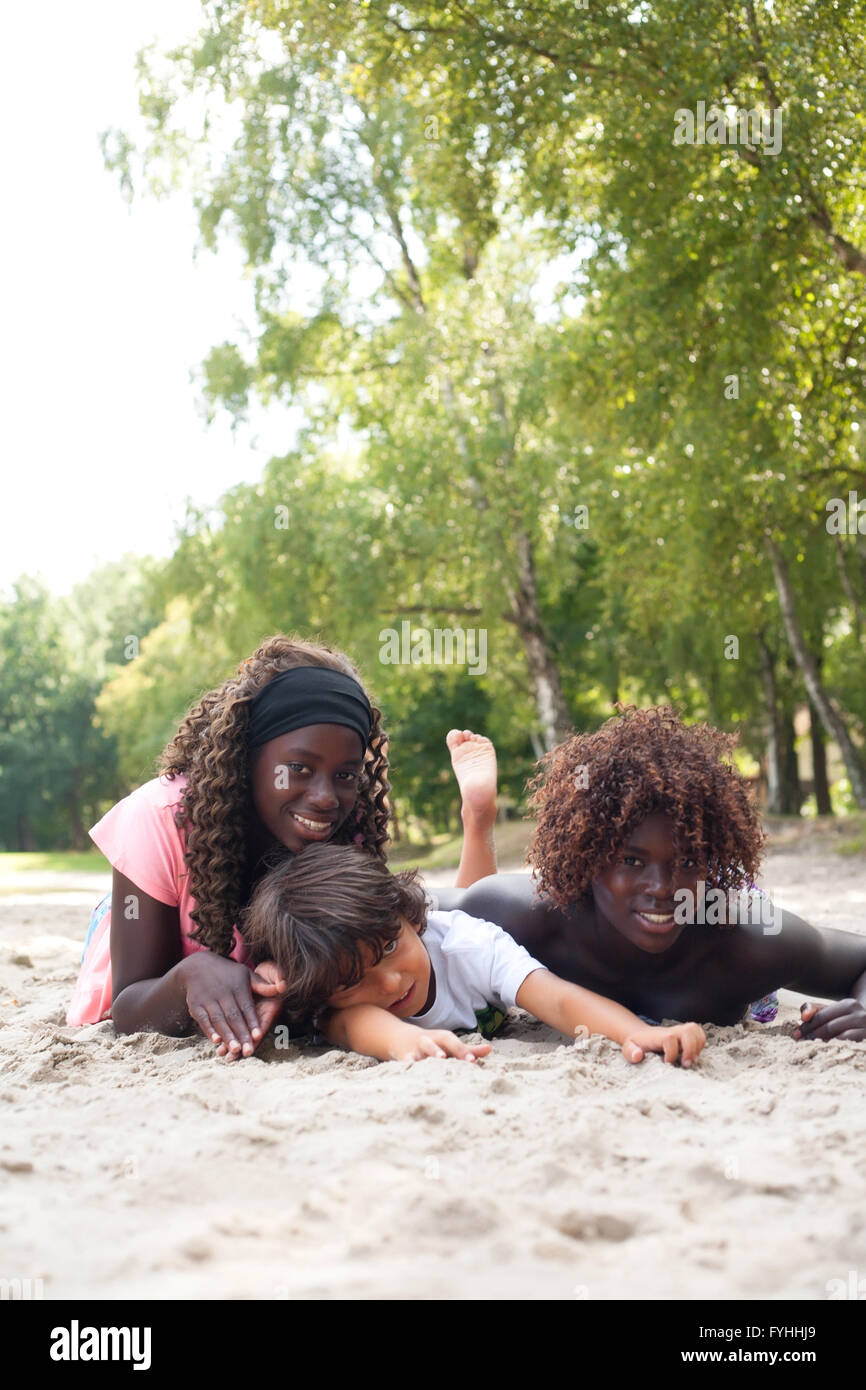 Summertime with the ethnic children Stock Photo - Alamy