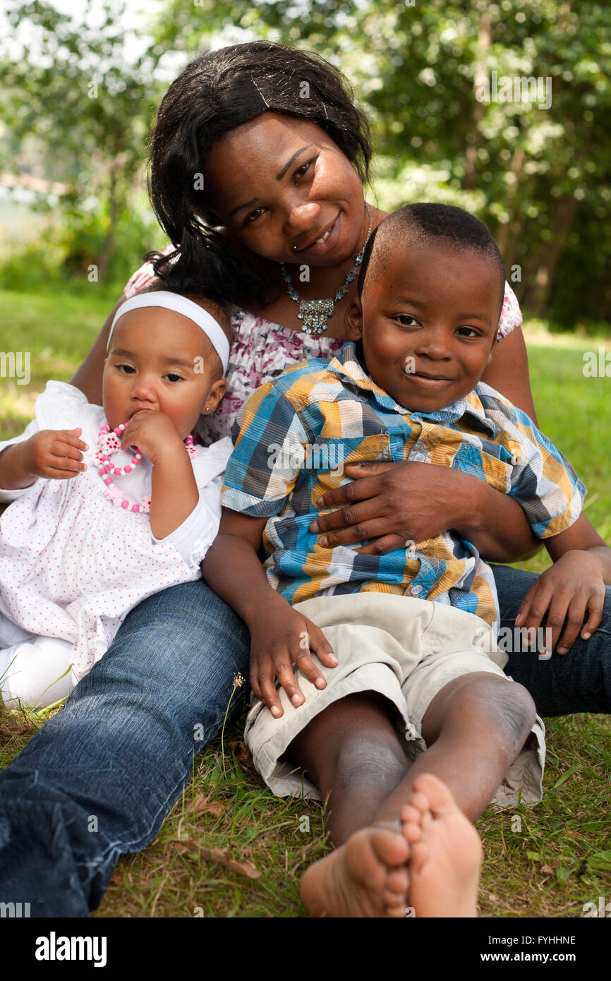 Happy african mother and children Stock Photo - Alamy