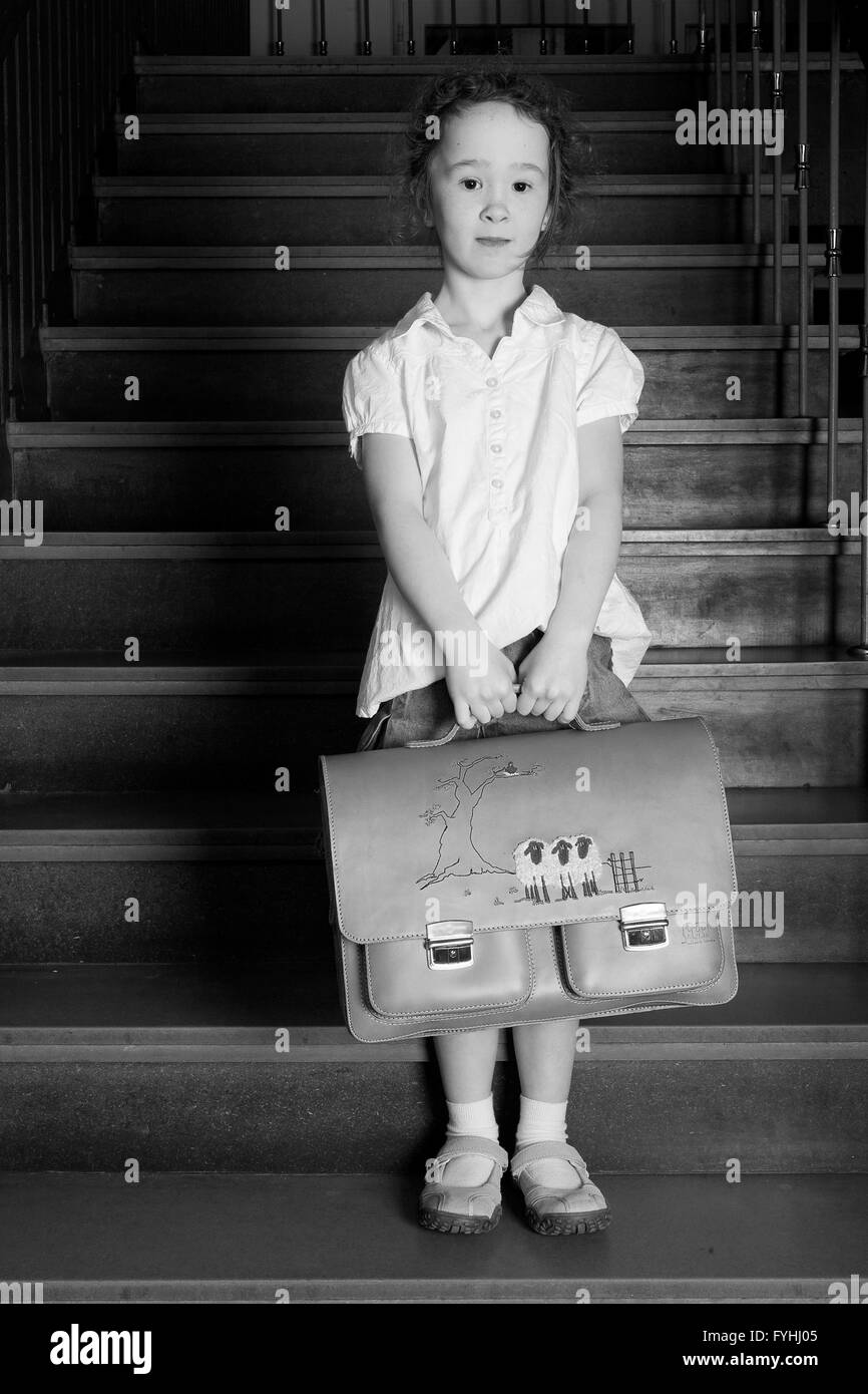 Little girl on the stairs Stock Photo - Alamy
