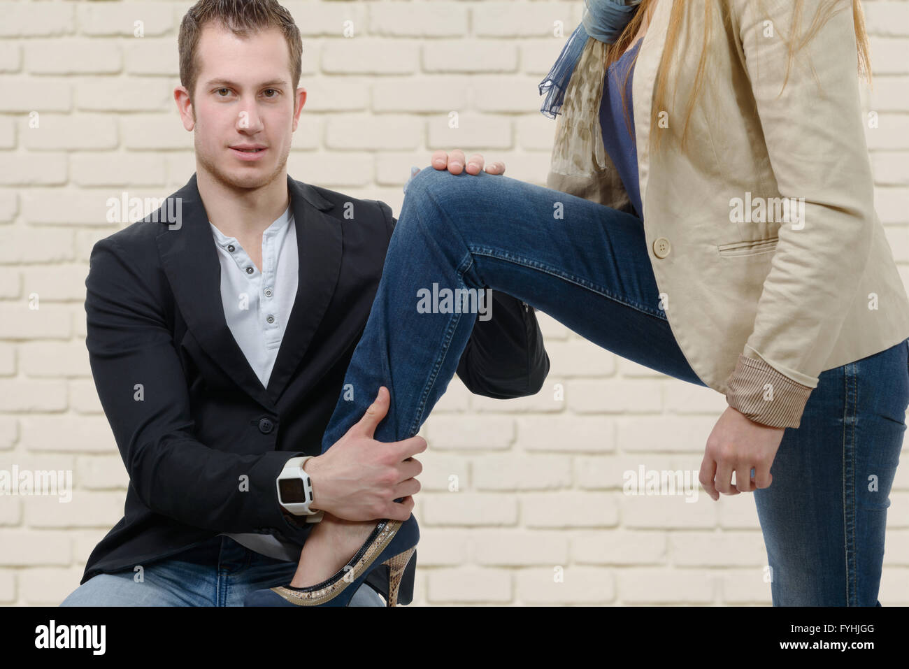 a young woman sets foot on her lover Stock Photo - Alamy