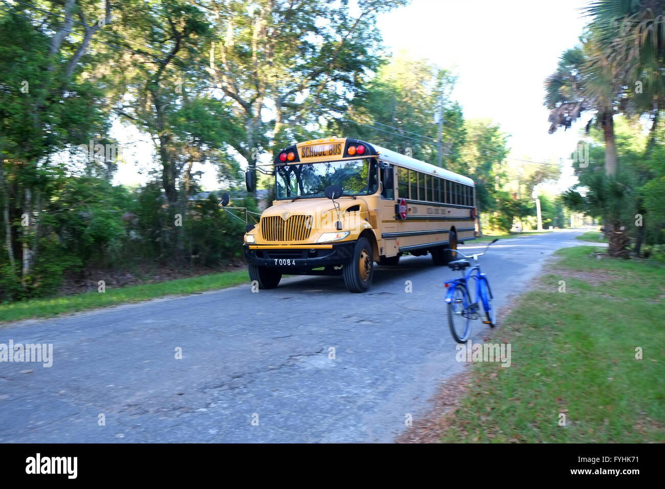 American school bus on a small county road in Florida, near Davenport ...