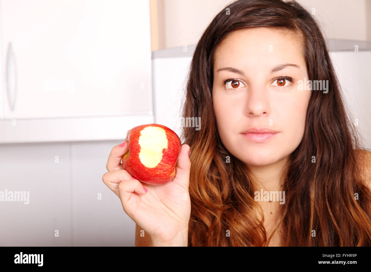Eating a apple Stock Photo - Alamy