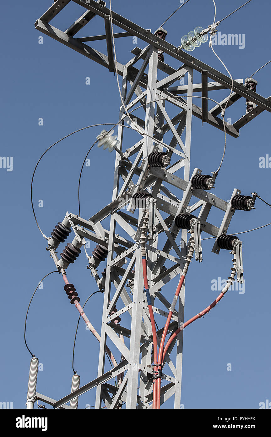 Electricity pylons with high-voltage wires Stock Photo - Alamy