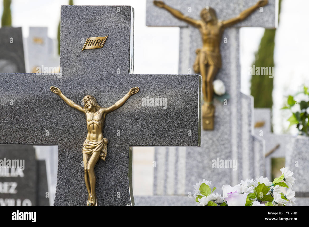 Jesus Christ on the cross in a cemetery Stock Photo - Alamy