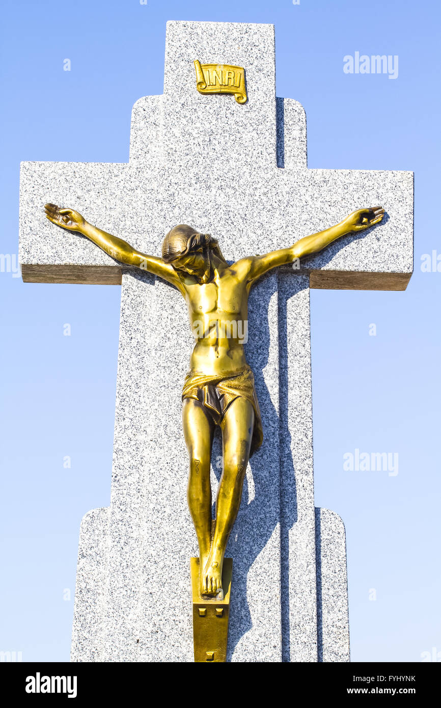 Jesus Christ on the cross in a cemetery Stock Photo - Alamy