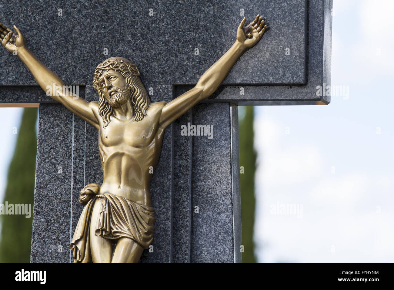 Jesus Christ on the cross in a cemetery Stock Photo - Alamy