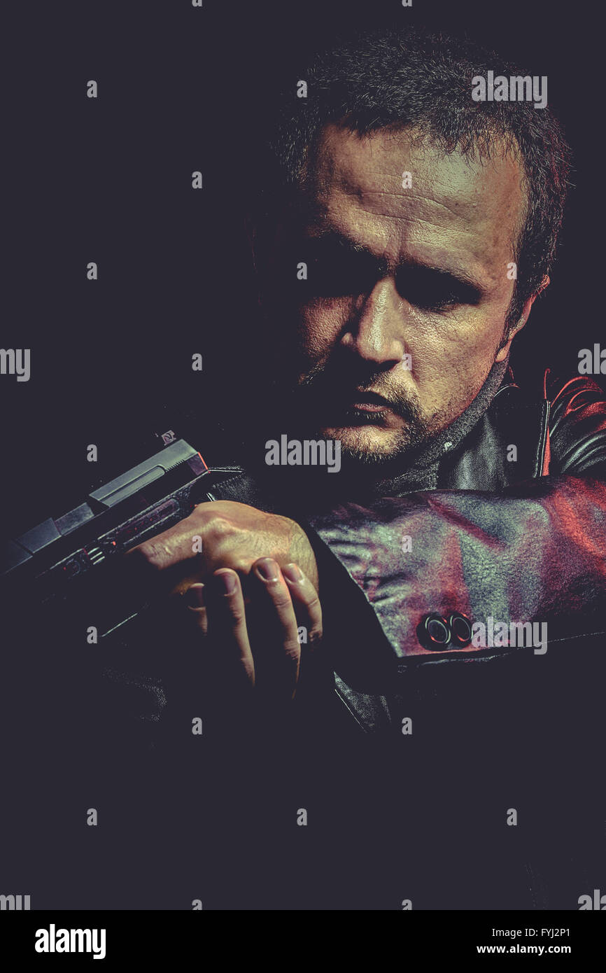 Man with gun Stock Photo - Alamy
