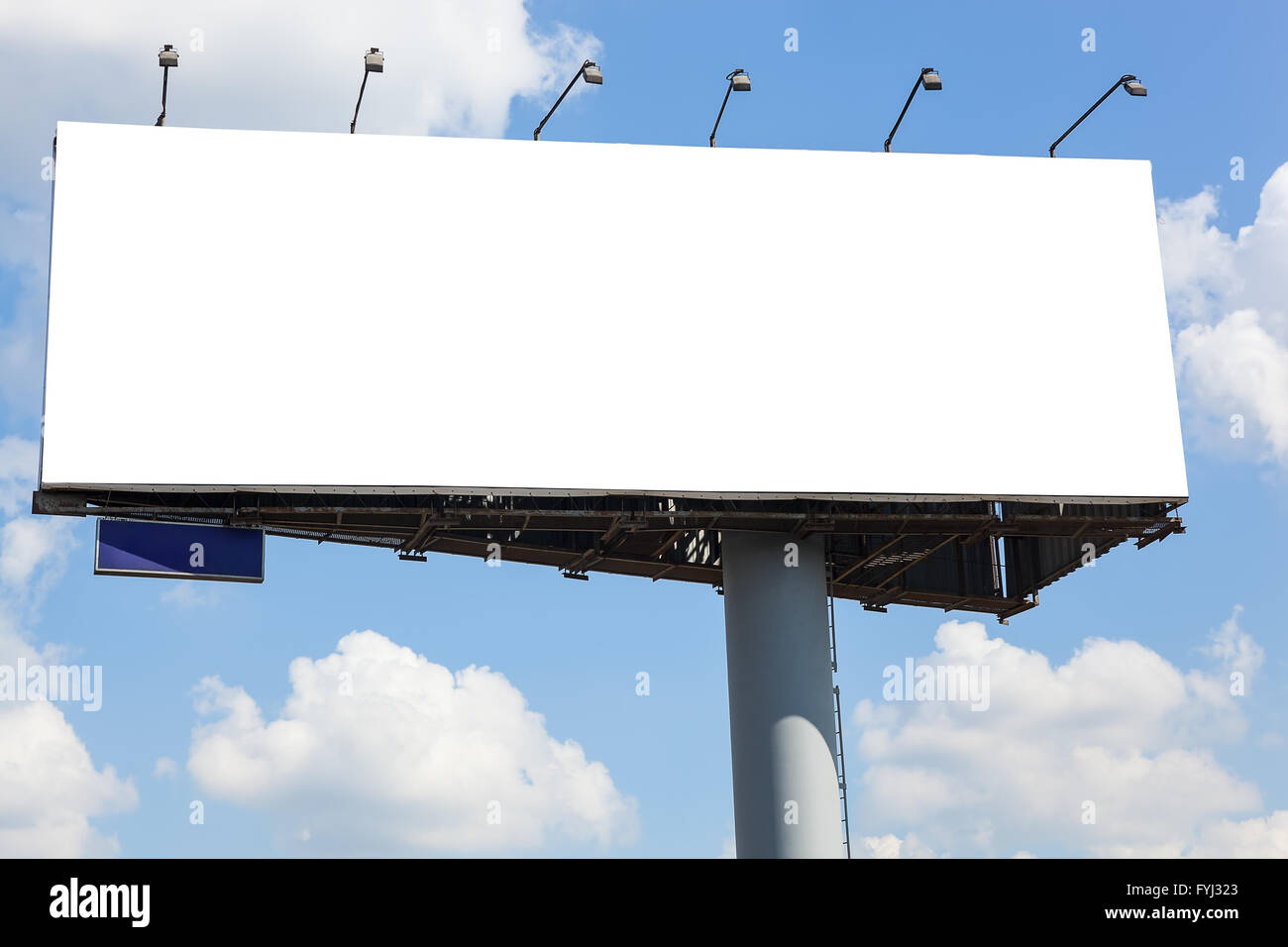 Blank billboard on blue sky background Stock Photo - Alamy