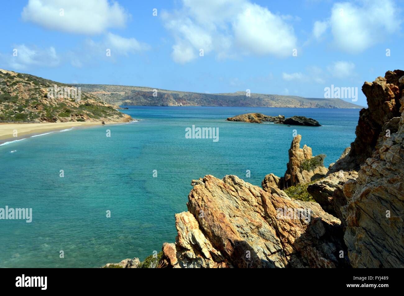 A creek in Crete with rocks, island and of the greenery Stock Photo - Alamy