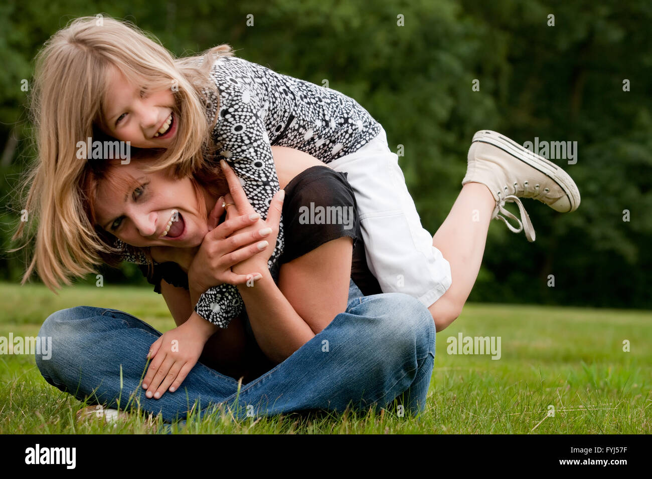 Ride on my mama Stock Photo - Alamy