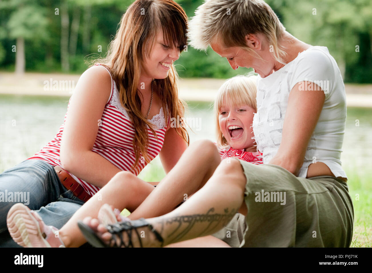 Tickling girls hi-res stock photography and images - Alamy